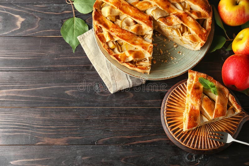 Plate and Board with Delicious Apple Pie on Wooden Table Stock Image ...