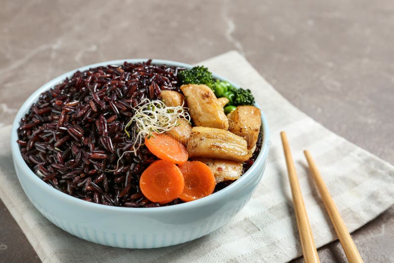 Plate of Boiled Brown Rice with Meat Served on Table, Closeup Stock ...