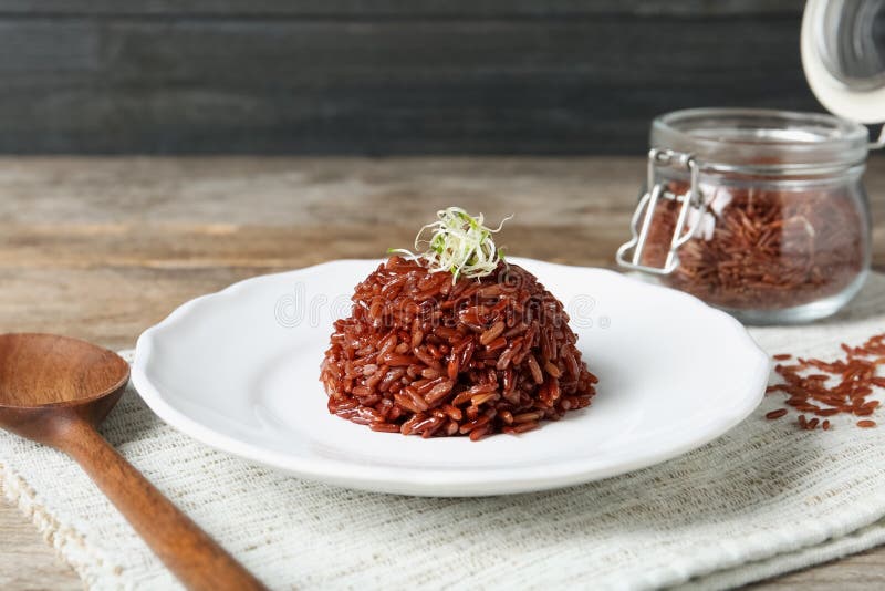 Plate of Brown Rice Served on Table Stock Photo - Image of food, long ...
