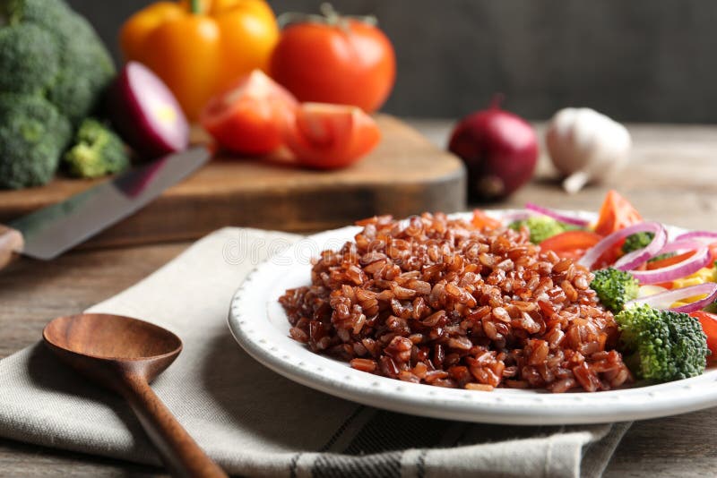 Plate of Boiled Brown Rice with Vegetables Served on Table, Closeup ...