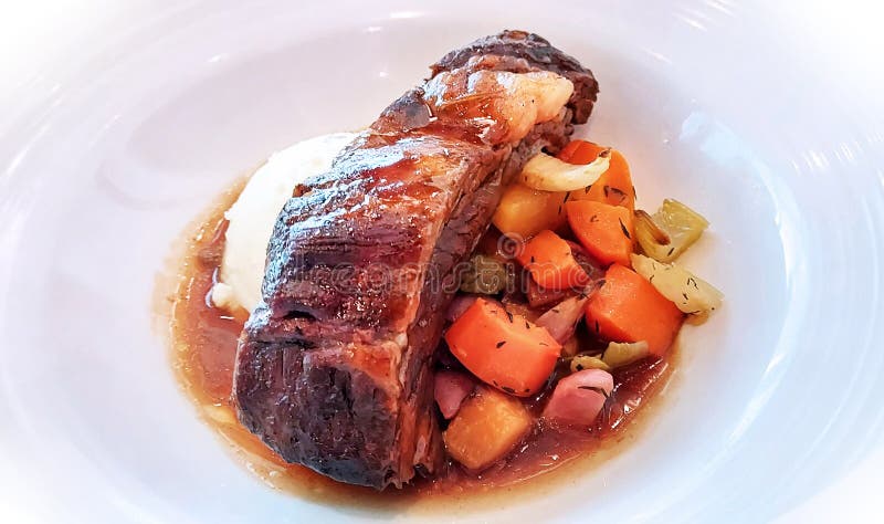 Plate of Braised Beef Short Rib with Roasted Vegetables and Mashed ...