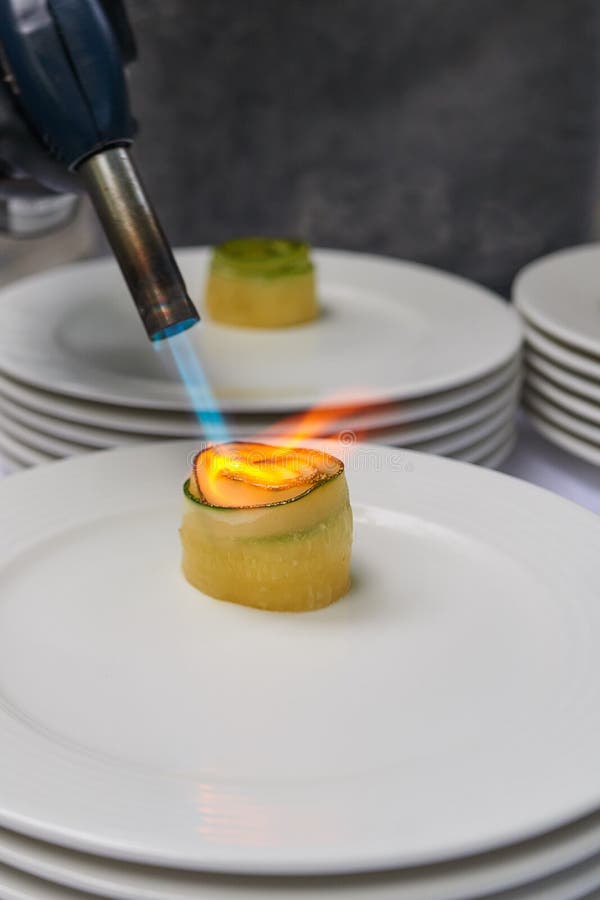 On a Plate with a Burner with Fire Stock Photo - Image of fire, cooker ...