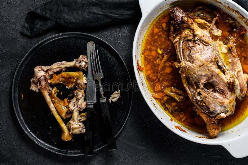 A Plate of Chicken Bones and a Chicken Skeleton in a Baking Dish ...