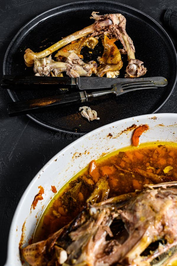 A Plate Of Chicken Bones And A Chicken Skeleton In A Baking Dish ...
