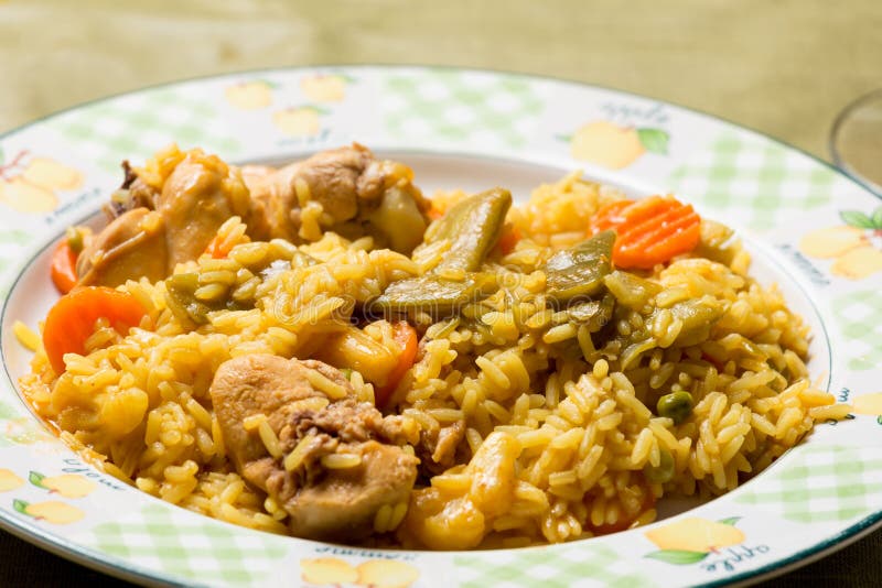 Plate of Chicken and Rabbit Paella Stock Image - Image of rice ...