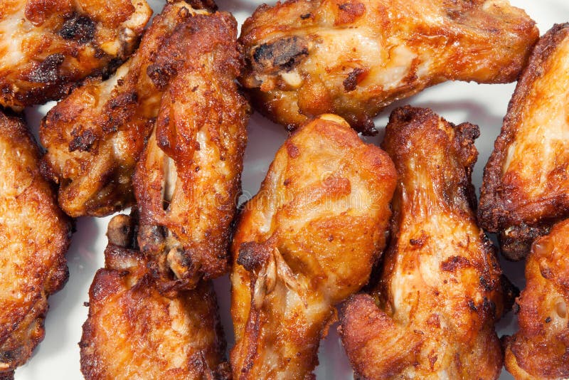 A plate of chicken wings stock image. Image of food, saucy - 19703779