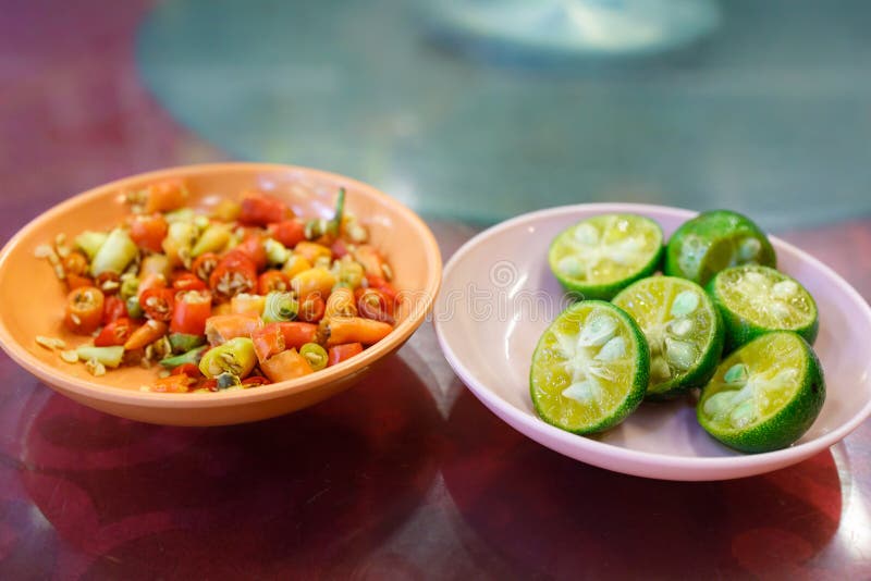 Plate of Chopped Chilli and Plate of Cut Limes Stock Image - Image of ...