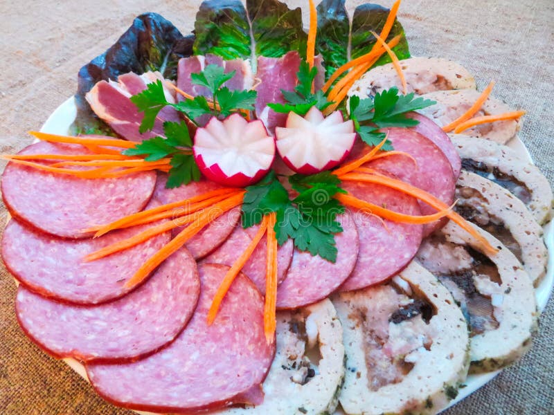 A Plate with Chopped Pieces of Sausage and Meat Stock Photo - Image of ...