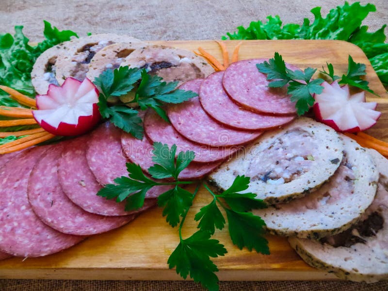 A Plate with Chopped Pieces of Sausage and Meat Stock Photo - Image of ...