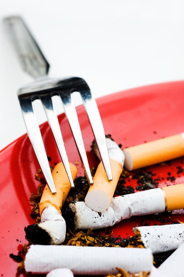 Plate with cigarette stock photo. Image of bistro, concept - 14670186
