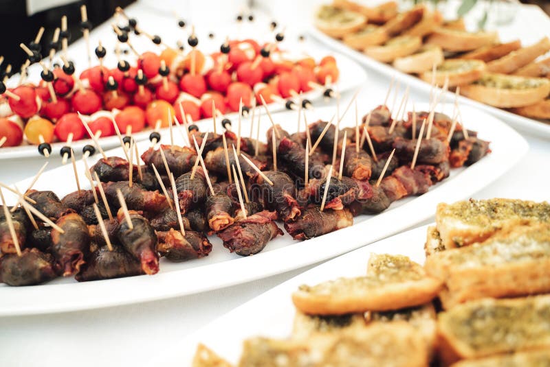 Plate of Cocktail Sausages Rolled in Bacon Stock Image - Image of ...