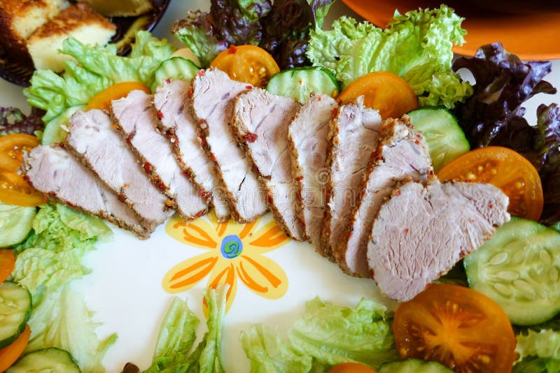 Plate of Cold Cuts with Greens, Cucumbers and Green Salad Leaves Stock ...