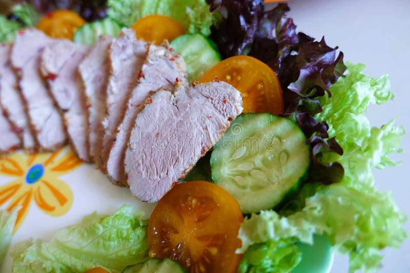 Plate of Cold Cuts with Greens, Cucumbers and Green Salad Leaves Stock ...