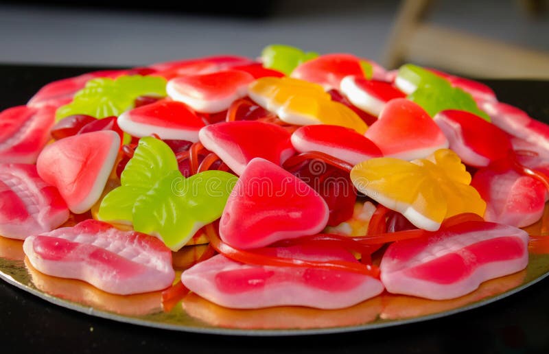 Plate of Colorful Gummy Candies with Different Shapes and Forms Stock ...