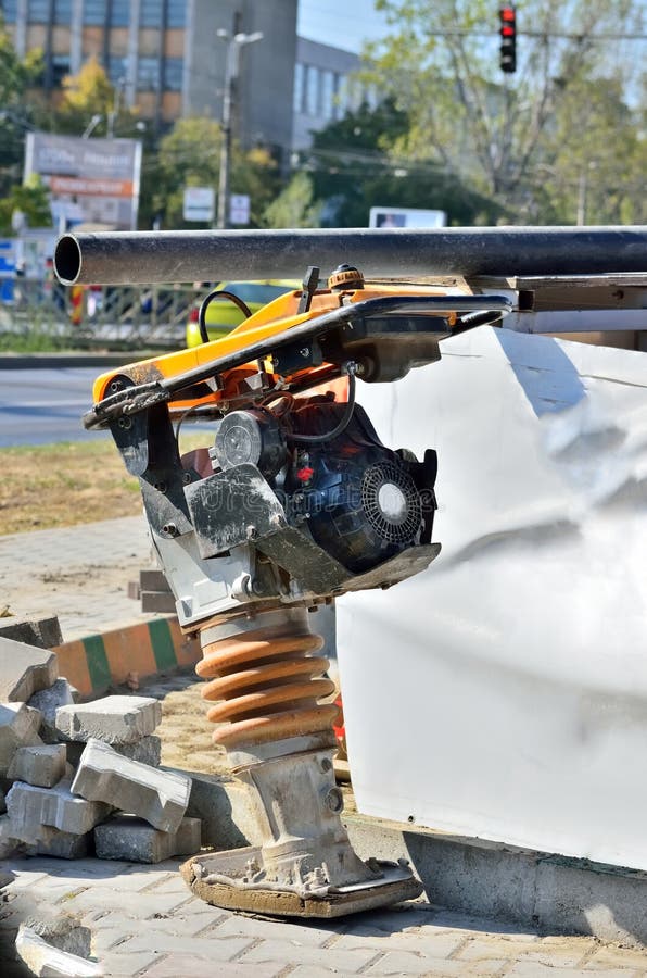 Plate Compactor at a Construction Site. Stock Photo - Image of tool ...