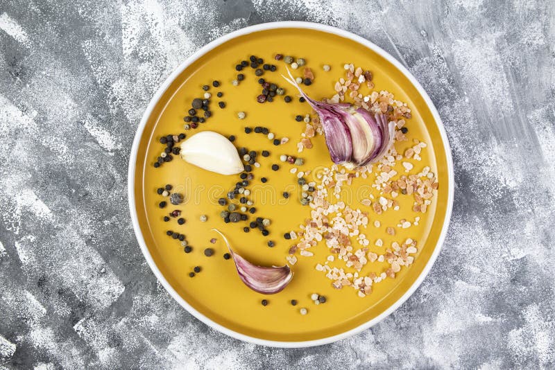 Plate with Condiments and Spices on Gray Table Top View Stock Image ...