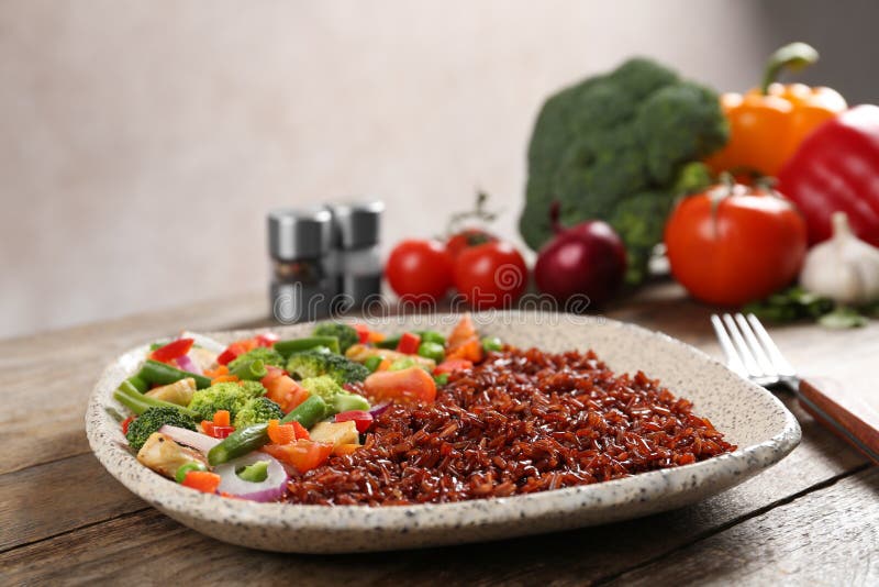 Plate with Cooked Brown Rice on Table. Stock Photo - Image of boiled ...