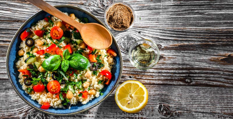 A Plate of Couscous Served with Vegetables and Chickpeas Stock Photo ...