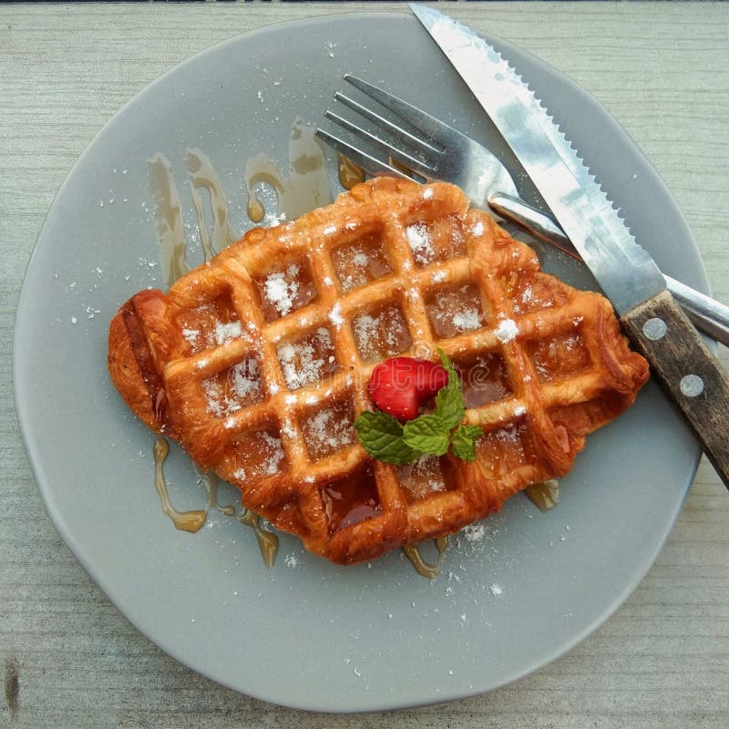 A Plate of Croffle with Stawberry Topping Stock Image - Image of food ...
