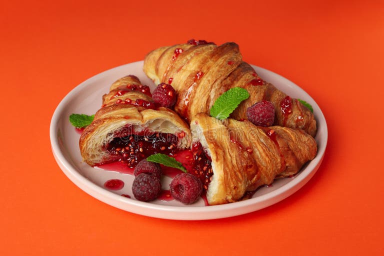 Plate with Croissants with Raspberry Jam on Orange Background Stock ...