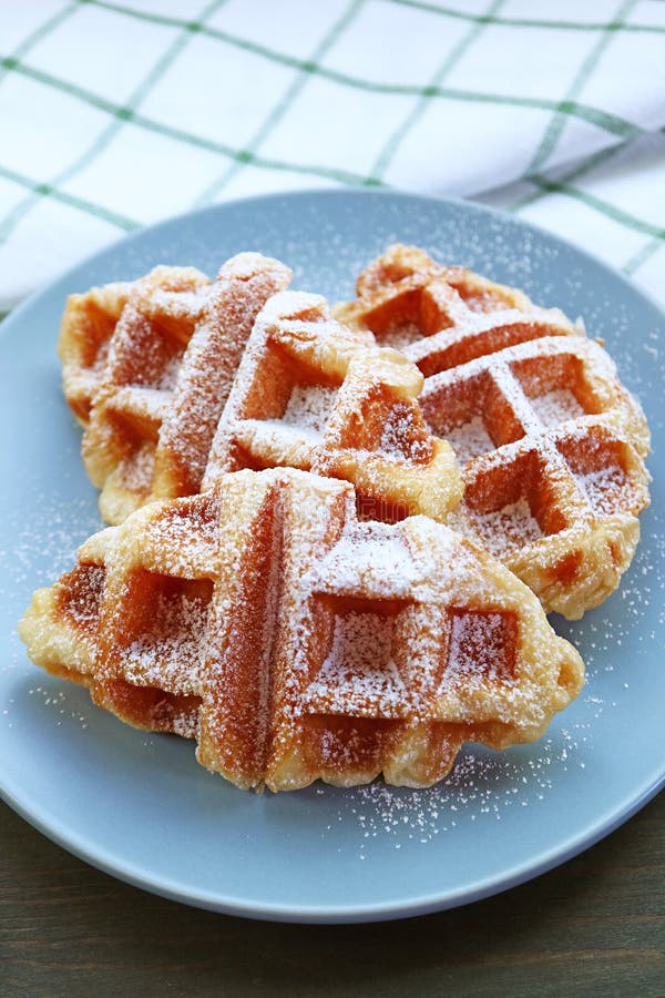 Plate of Croffles or Croissant Waffle Sprinkled with Icing Sugar Stock ...