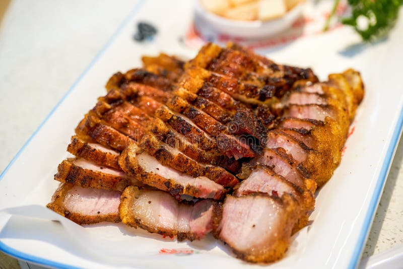 A Plate of Delicious Crispy Crispy Meat Stock Image - Image of cooking ...