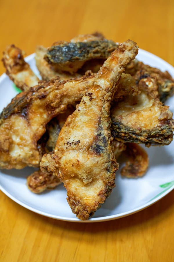 A Plate of Delicious Fried Grass Carp Belly Closeup Stock Photo - Image ...