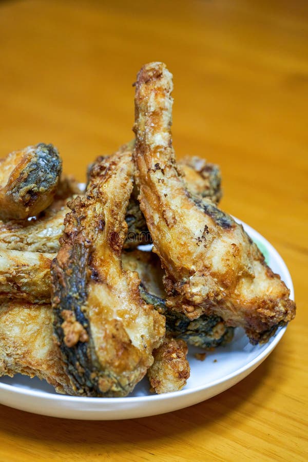 A Plate of Delicious Fried Grass Carp Belly Closeup Stock Photo - Image ...