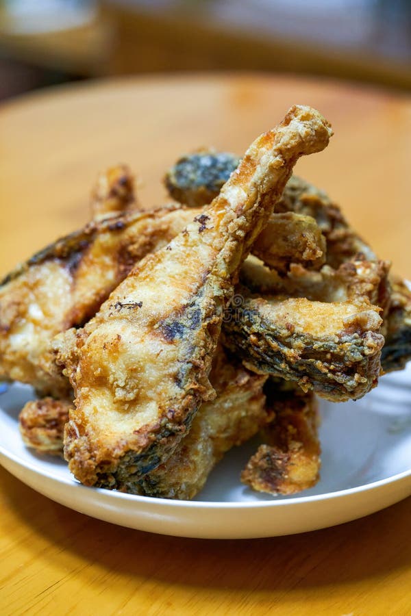 A Plate of Delicious Fried Grass Carp Belly Closeup Stock Photo - Image ...