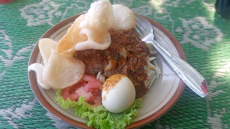A Plate of Delicious Gado Gado on a Mat with a Backdrop Stock Photo ...