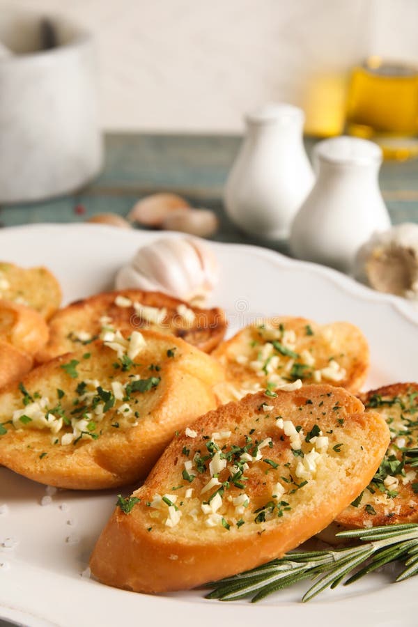 Plate with Delicious Homemade Garlic Bread. Space for Text Stock Image ...