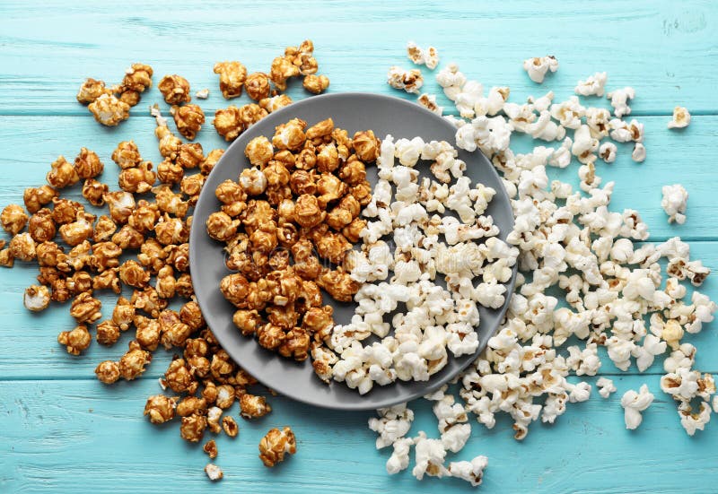 Plate with Popcorn on a Red Background. Layout. Top View Stock Image ...
