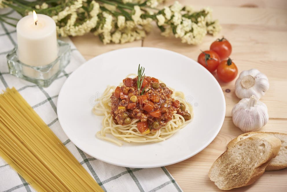 A Plate of Spaghetti on the Table Stock Photo - Image of meal ...
