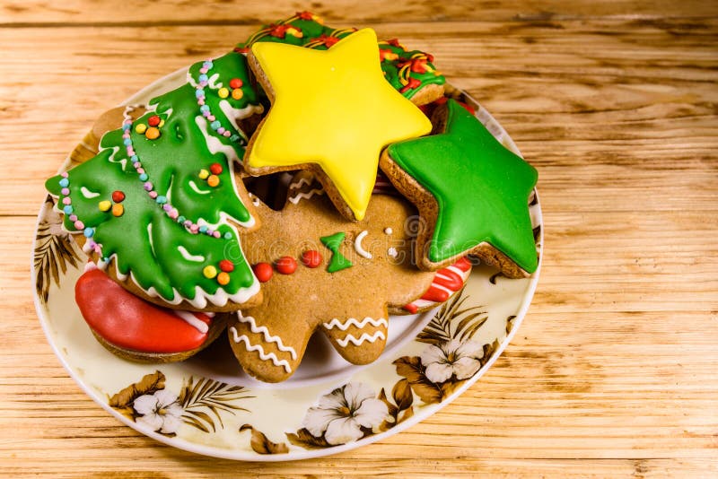 Plate with Different Christmas Gingerbread Cookies on Wooden Table ... Plate with Different Christmas Gingerbread Cookies on Wooden Table ...