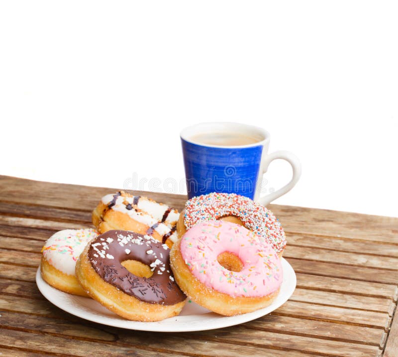 Plate of Donuts and Blue Coffee Mug Stock Image - Image of copy, glazed ...