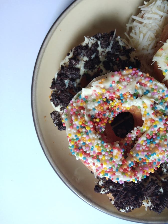 A plate on doughnuts stock image. Image of colour, colourfull - 206885701