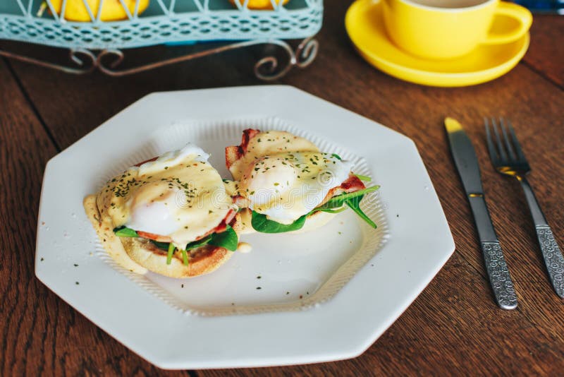 Plate of Eggs Benedict stock photo. Image of english - 127253532