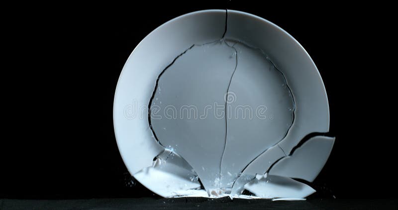 Plate Falling and Exploding on Black Background Stock Photo - Image of ...