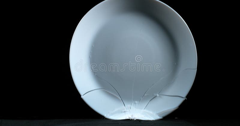 Plate Falling and Exploding on Black Background Stock Image - Image of ...