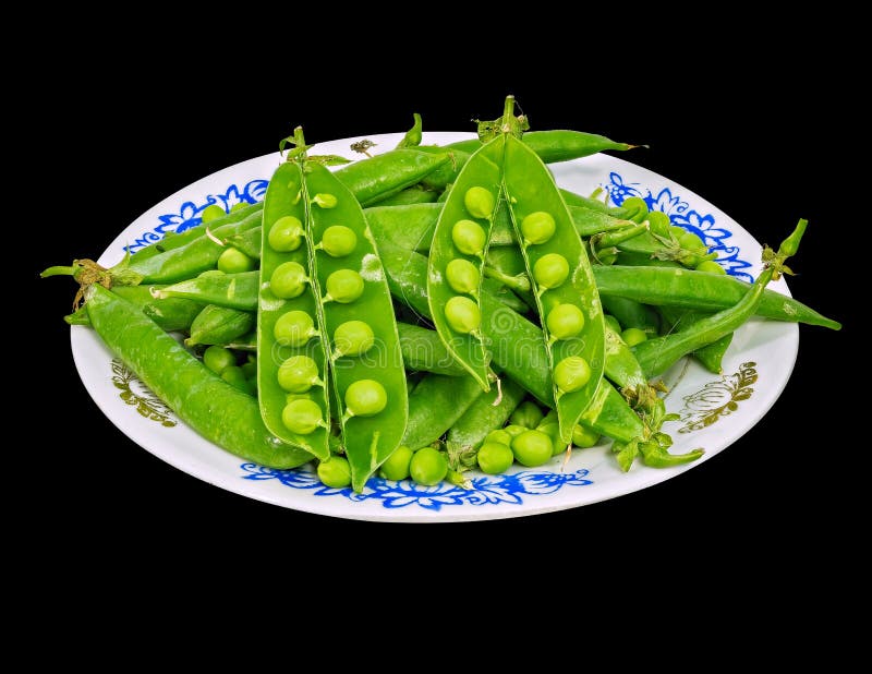 The Plate is Filled with Ripe Green Peas. Cut on Black Background Stock ...