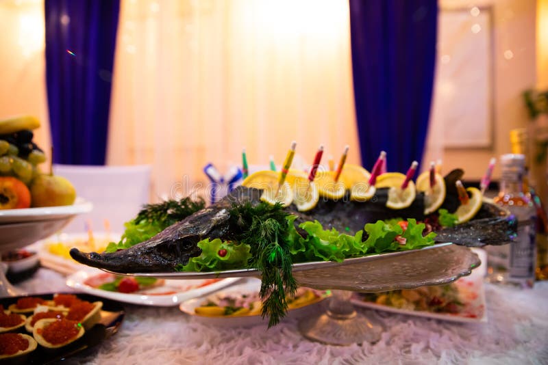 Plate with Fish on Banquet Table Stock Photo - Image of grilled, main ...