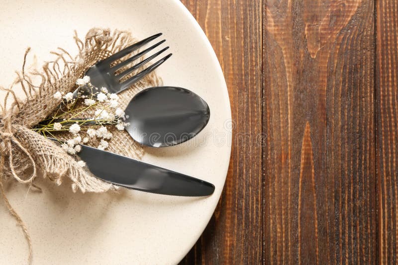 Plate and Flatware on Wooden Table, Closeup Stock Photo - Image of ...