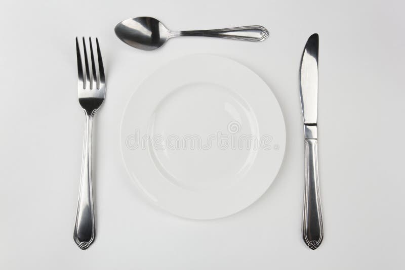 Dinner plate and utensils stock image. Image of isolated - 5105481