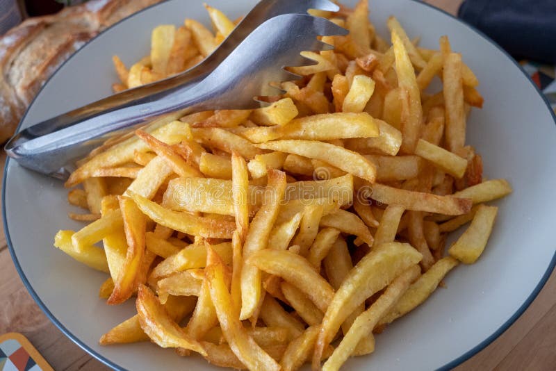 Plate of french fries stock photo. Image of prepared - 215401232