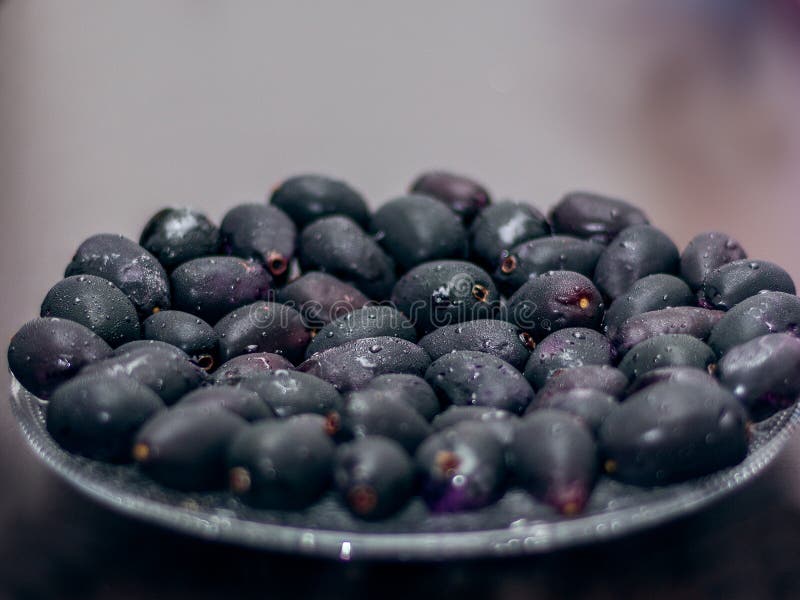 A Plate of Fresh Black Plum Stock Photo - Image of food, indian: 139598256