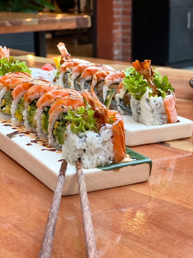 A Plate of Fresh Different Sushi Rolls at Restaurant on a Table Stock ...
