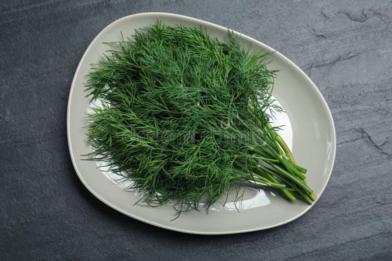 Plate of Fresh Dill on Black Table, Top View Stock Image - Image of ...