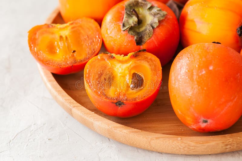 Plate of Fresh and Ripe Persimmons. Stock Photo - Image of natural ...