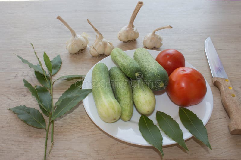 Plate with Fresh Vegetables on Table. Cucumber. Fresh, Raw Vegetables ...