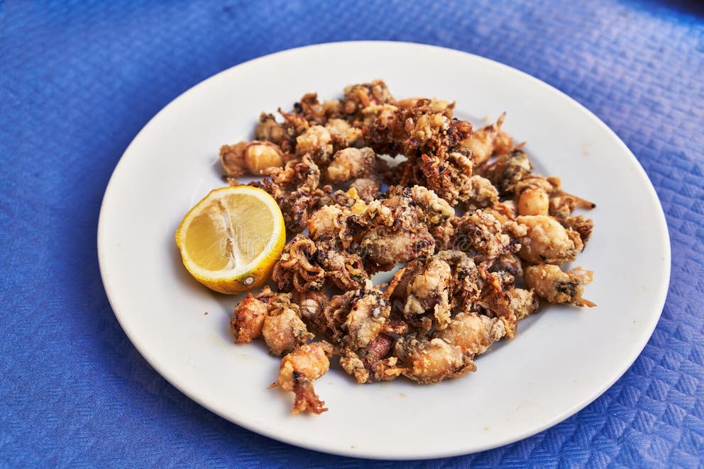 Plate of Fried Chopitos on Paper Surface Stock Image - Image of food ...